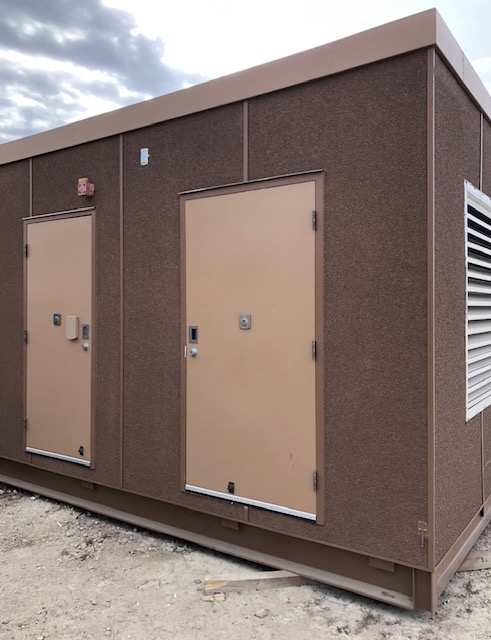 2000 11.5 x 30 Lightweight metal framed communication building with ...